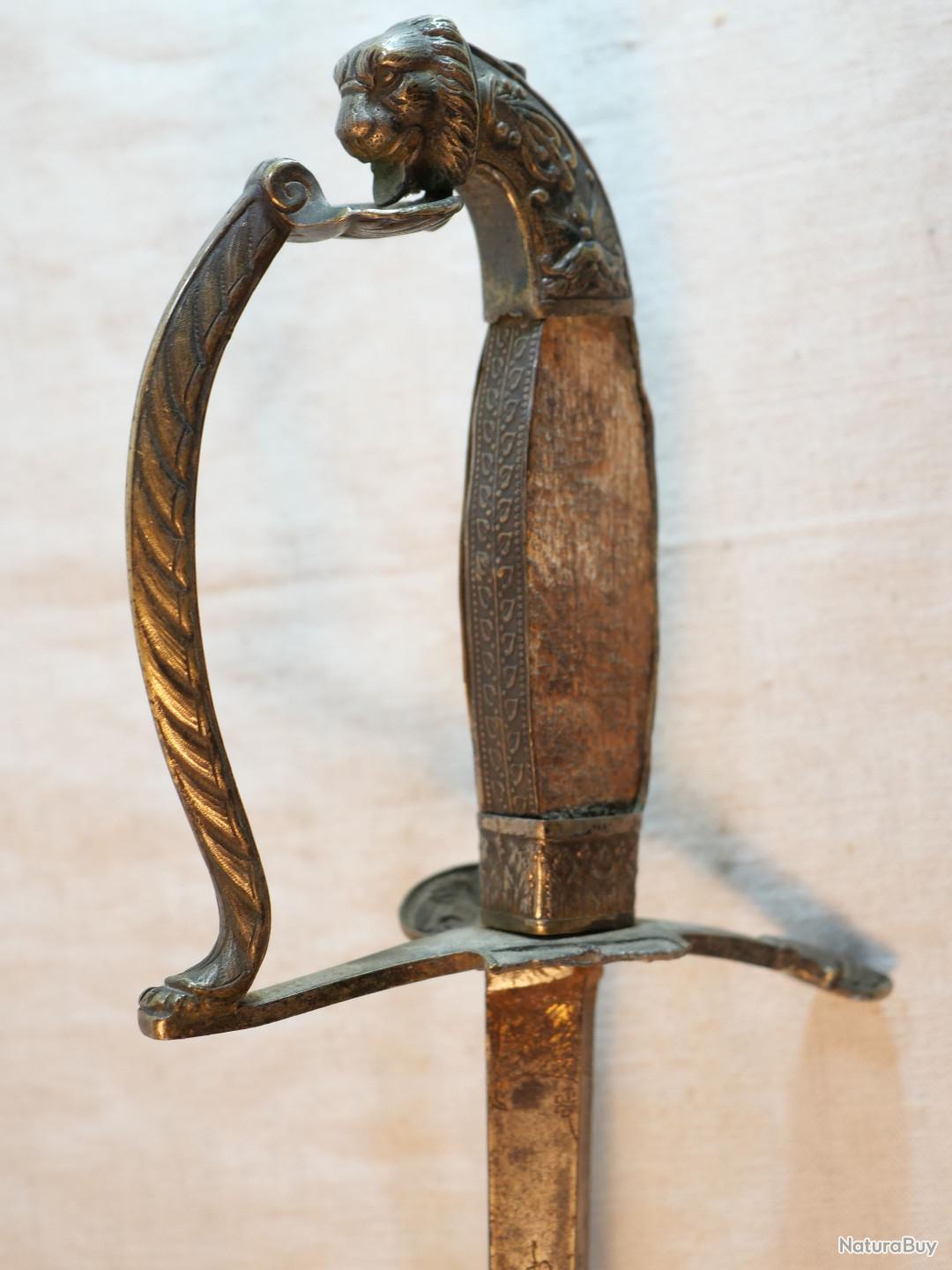 épée du 1er Empire d'officier supérieur à tête de lion langue pendante ...